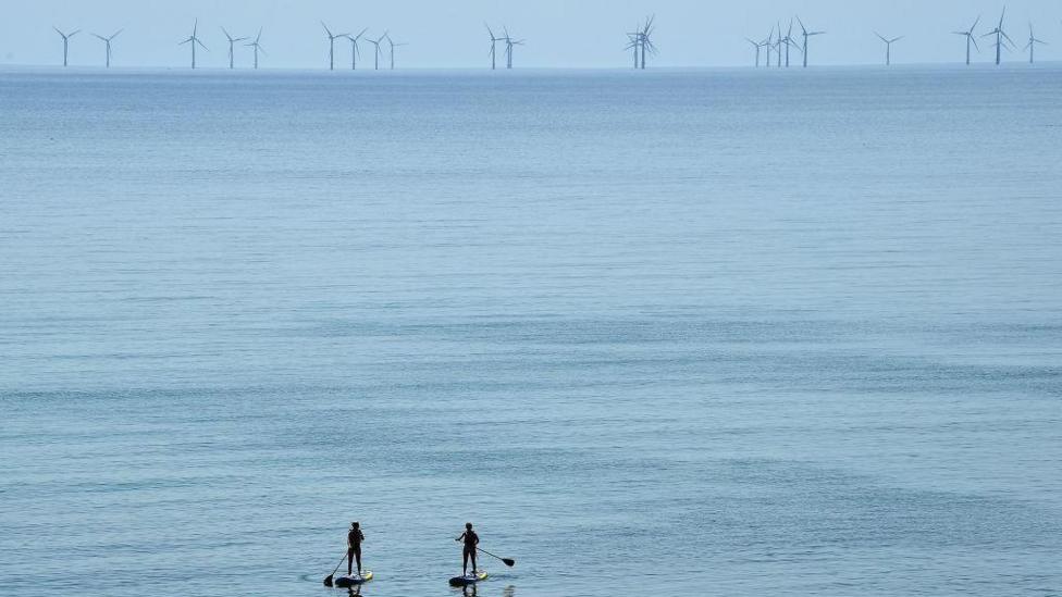EastEnders: Actor to swim to Sussex wind farm for charity - BBC News