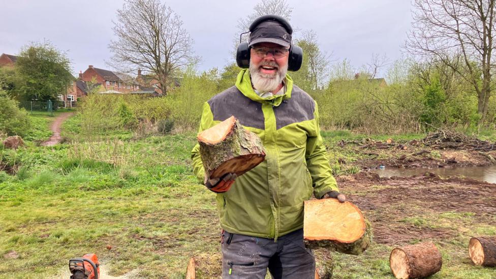Fallen tree in Madeley carved into bench and sculpture - BBC News