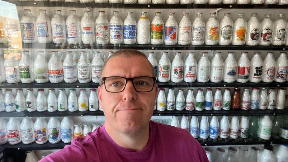 Essex milk enthusiast Paul Luke collects 20,000 bottles at home - BBC News