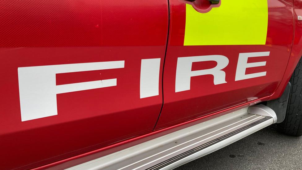 A36 closed after car fire following collision - BBC News