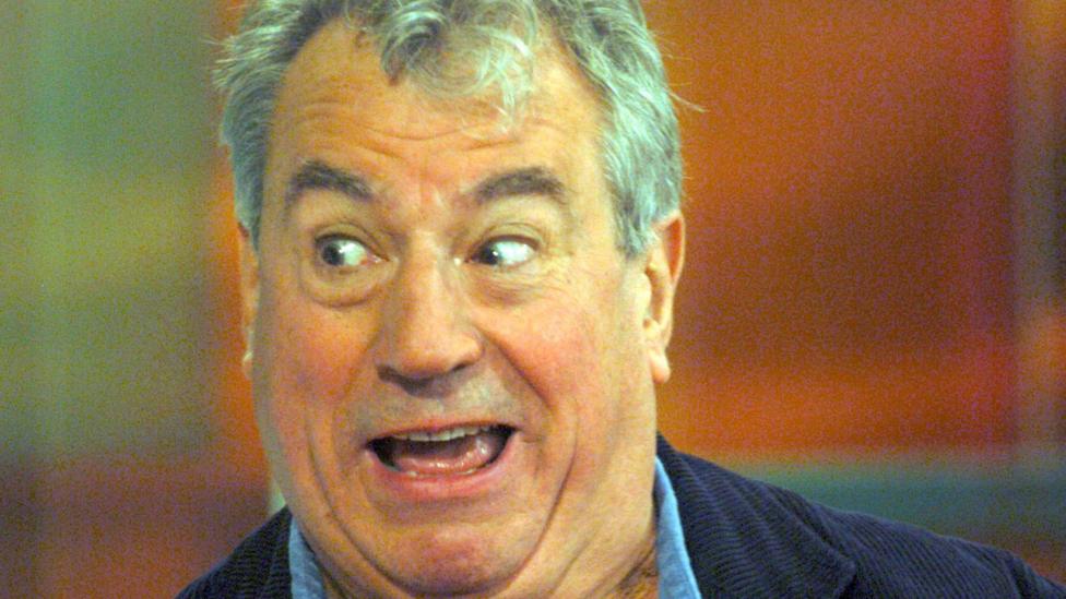 Monty Python's Terry Jones nude statue unveiled in Colwyn Bay - BBC News