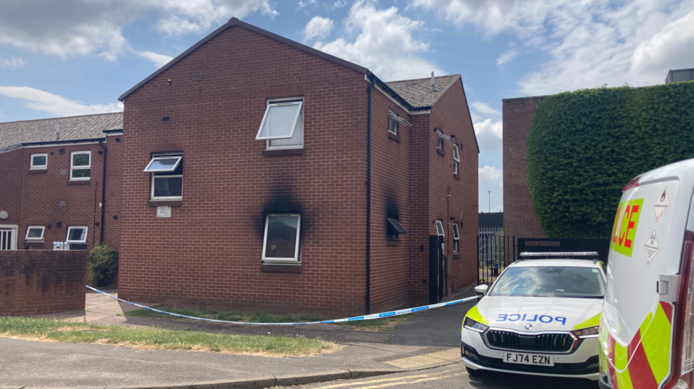 Woman taken to hospital after Beeston flat fire rescue - BBC News