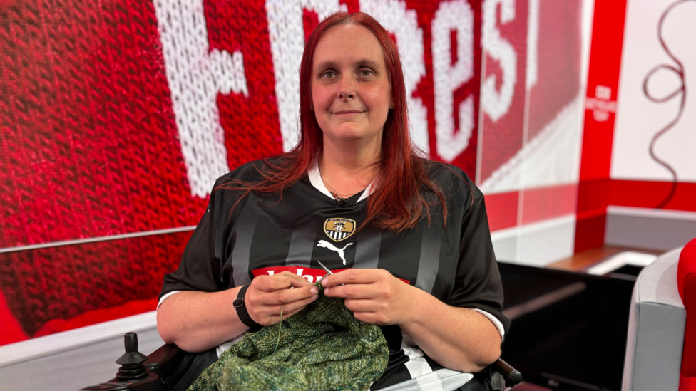 Football fan shares story behind her match-time knitting hobby - BBC News