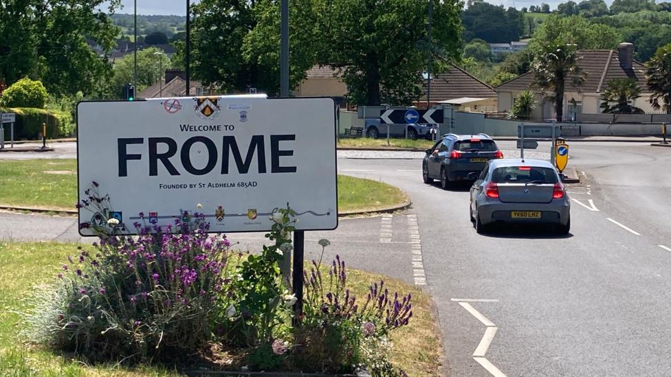 A Welcome to Frome road sign has been moved to Midsomer Norton - BBC News