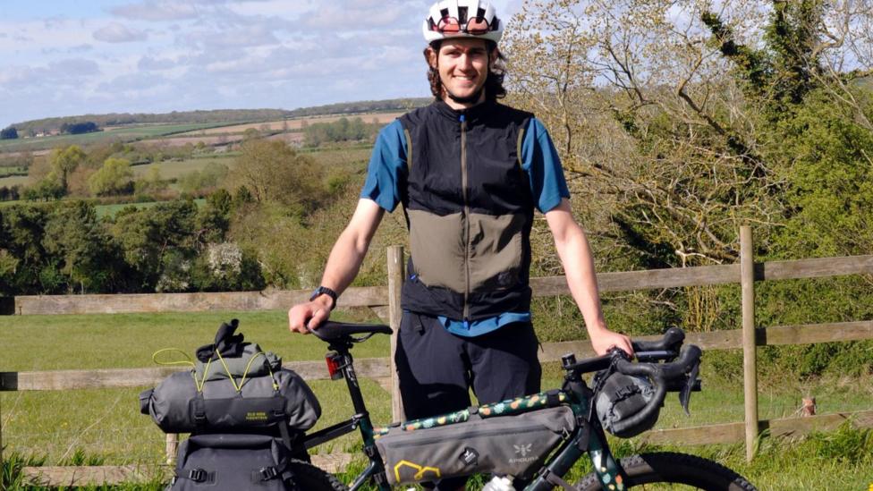 Cyclist's round-the-world trip inspired by grandad's benevolence - BBC News