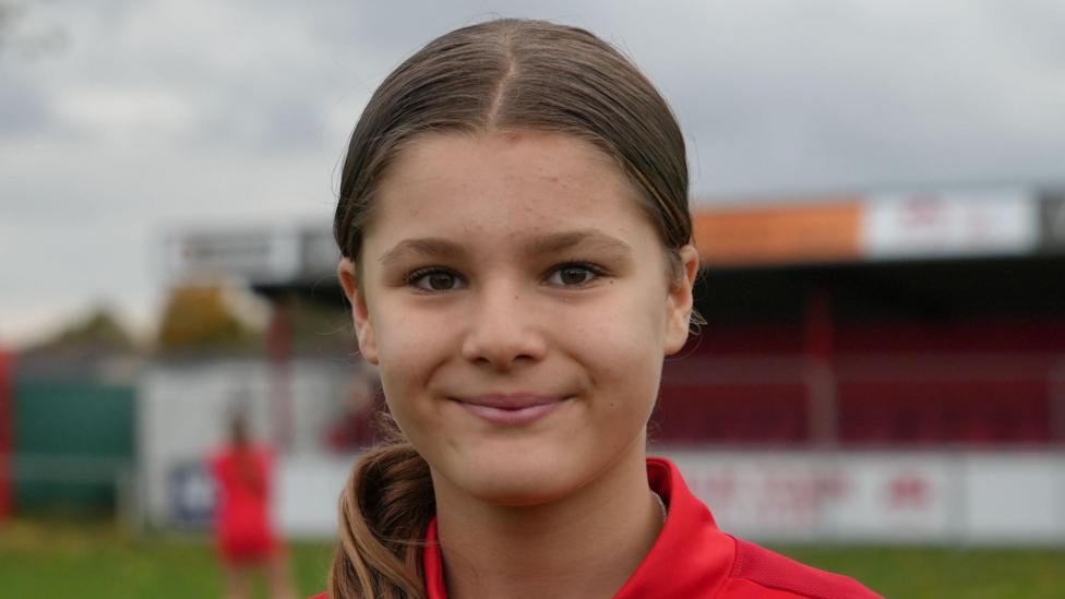 Downham Town coach nets £90k on The Wheel and treats girls' team - BBC News