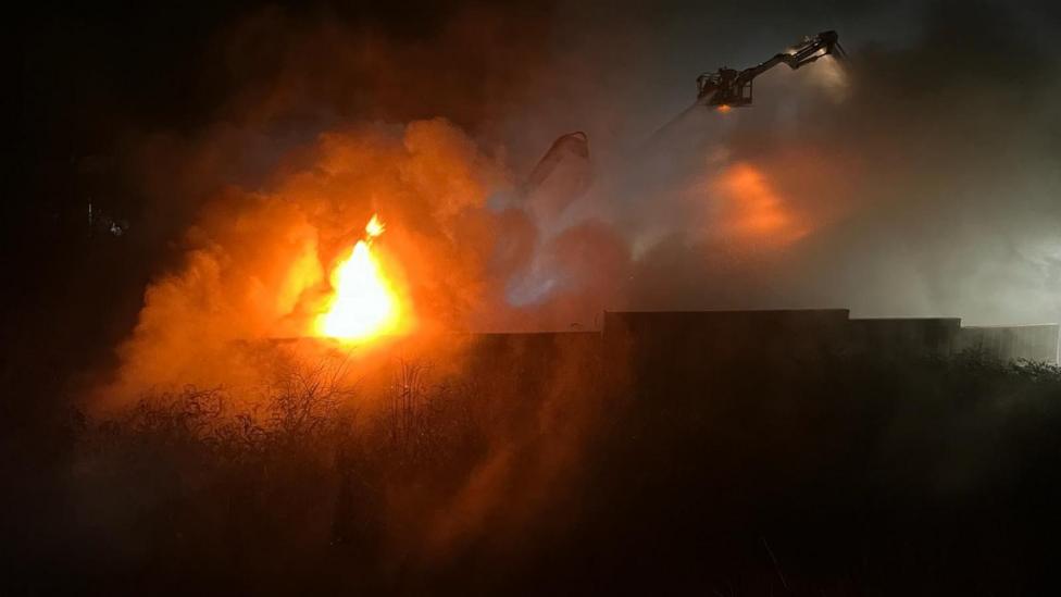 Hitchin recycling centre fire out after seven hours - BBC News