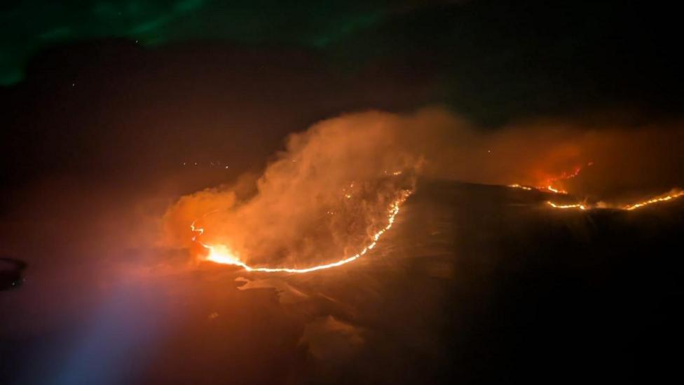 Evacuations as wildfire spreads north through Galloway forest - BBC News