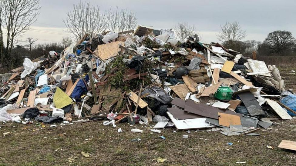 Hertfordshire farmer baulks at £40k cost to remove dumped waste - BBC News
