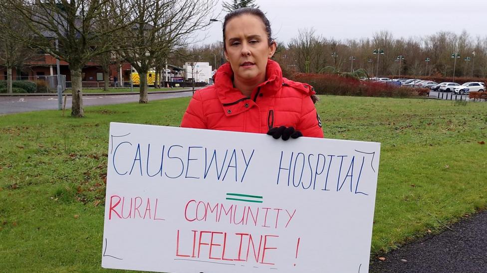 Protest at Causeway Hospital against remove of emergency surgery - BBC News