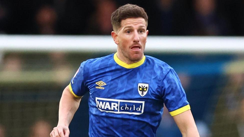 Sam Hutchinson: Midfielder to stay with AFC Wimbledon until end of ...