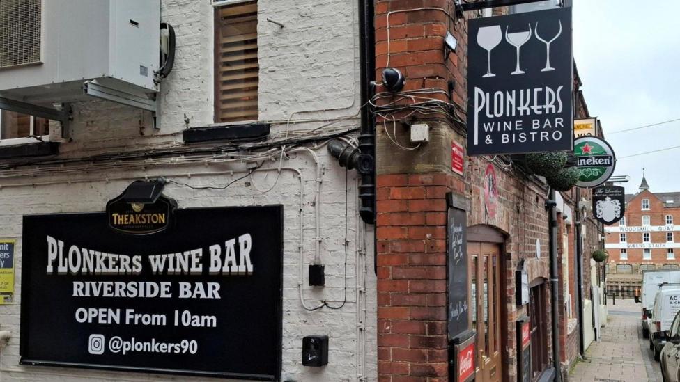 York wine bar will no longer sell US goods in tariff protest - BBC News