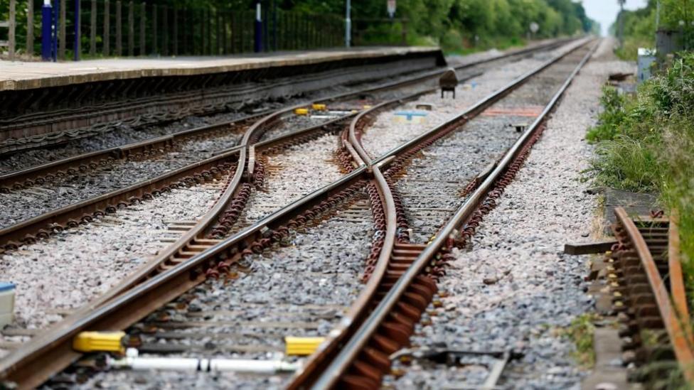 Rail line shut after Audenshaw freight train derailment - BBC News