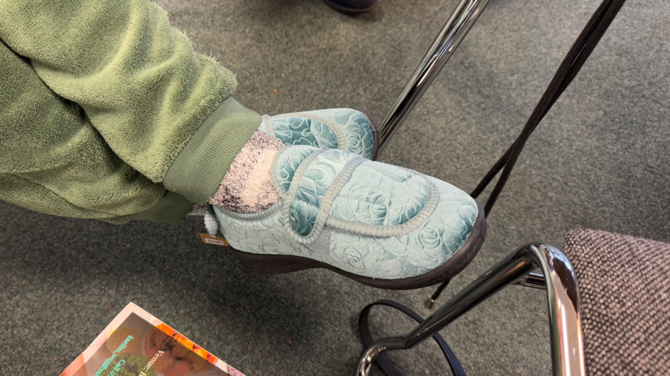 Ipswich slipper swap shop event aims to prevent tumbles - BBC News