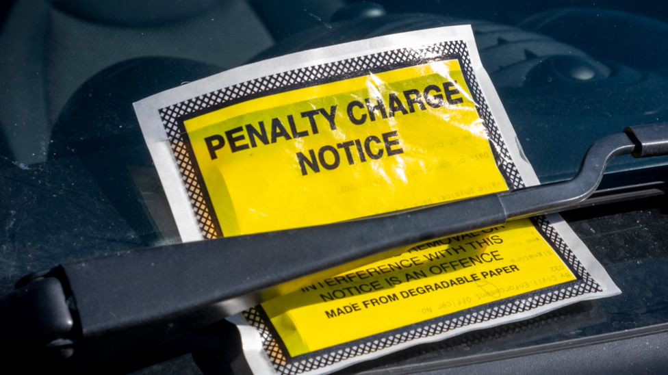 Council warning over fake penalty notices sent by text - BBC News
