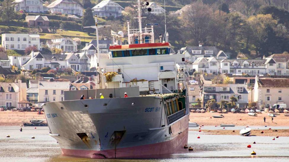 Cargo ship refloated after running aground in Teignmouth harbour - BBC News