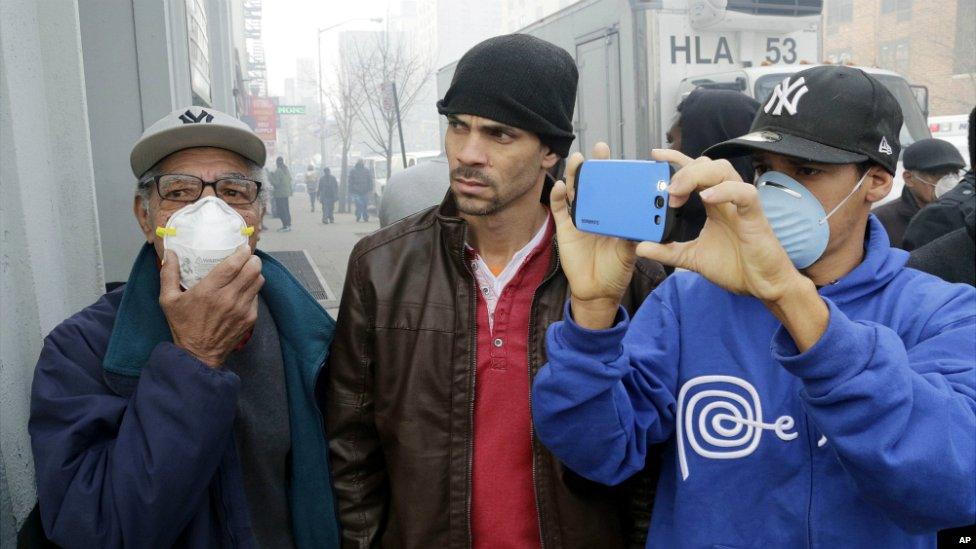 In pictures: New York building collapses after blast - BBC News