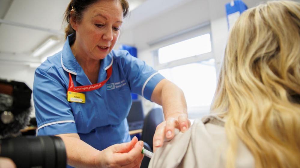 'I had the jab - but ended up in hospital with super flu' - BBC News