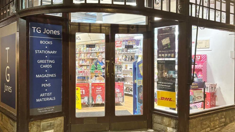 TG Jones set to correct 'stationary' sign in former WH Smith shop - BBC ...