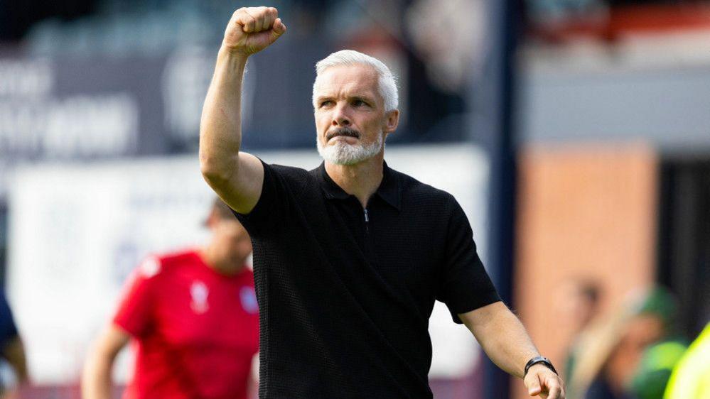 Jim Goodwin 'loving life' at United after 'lucky' appointment - BBC Sport