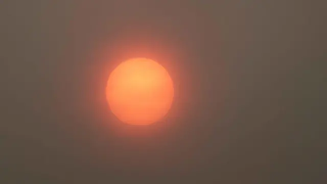 Las causas detrás del inusual sol rojo que se vio en algunas partes de ...