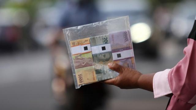 Idul Fitri: Tradisi pembagian uang ke anak-anak saat Lebaran, bisa ...