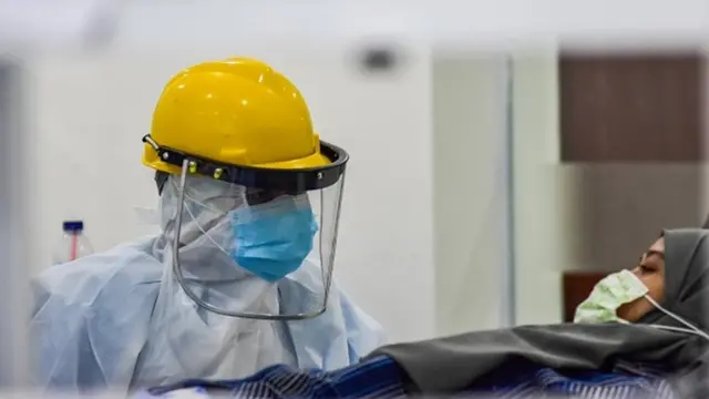 Covid-19: 'Petugas kesehatan di garis depan dan kelompok rentan' diprioritaskan sebagai penerima ...