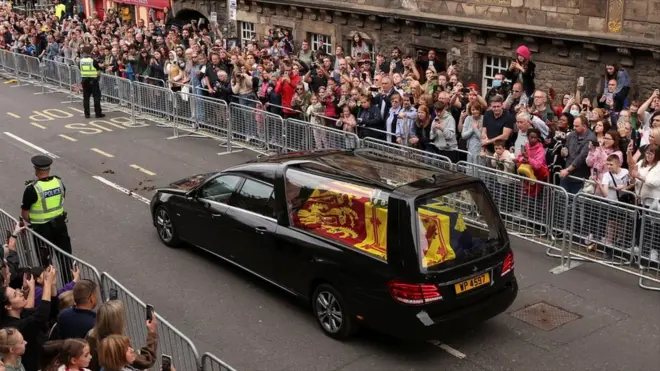 There was applause from mourners as the Queen's cortege travelled through the city centre