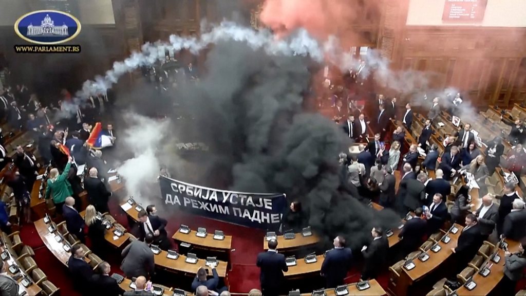 Chaos as MPs throw smoke grenades inside Serbian Parliament