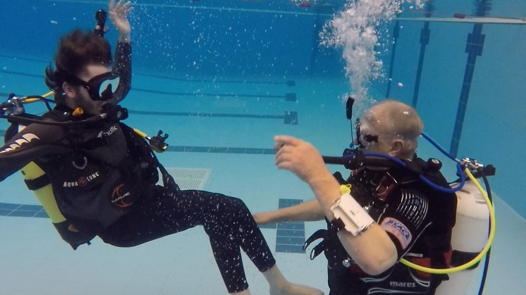 Paralysed man on how scuba diving brings him happiness - BBC News