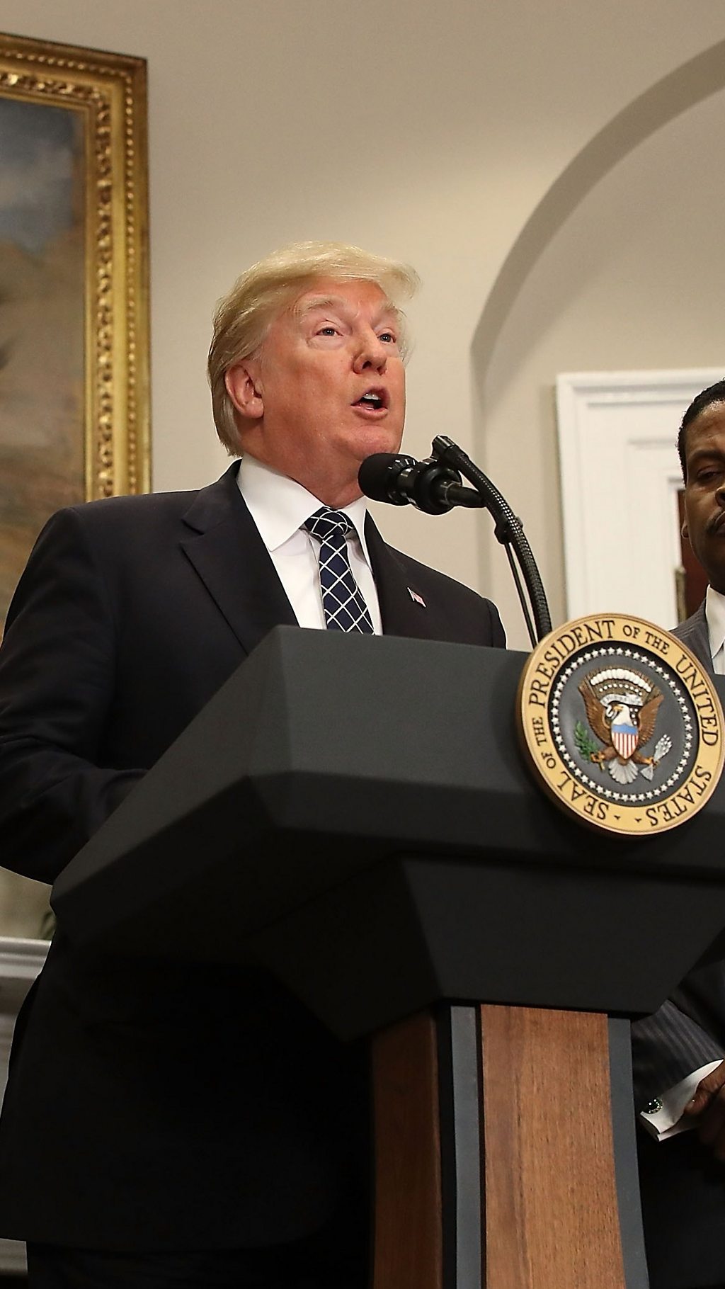 President Trump honours MLK amid 'racist slur' controversy