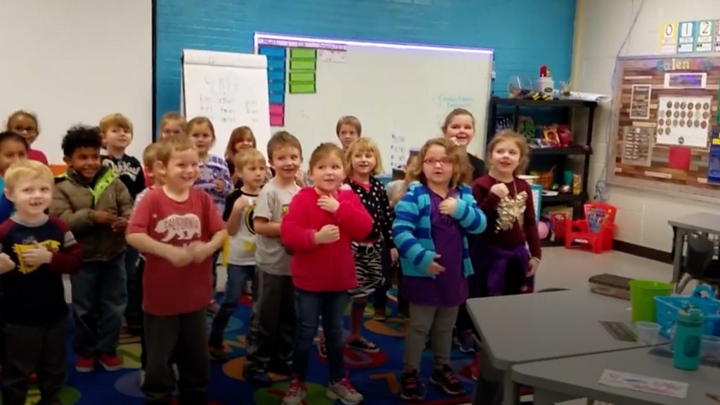 Children's sign language surprises school janitor
