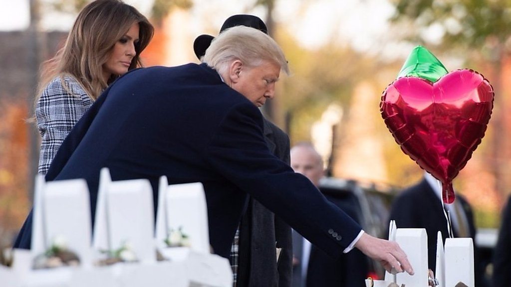 Trump visits Pittsburgh shooting site amid protests - BBC News