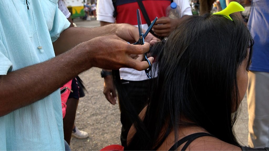 Desperate Venezuelan women selling their hair