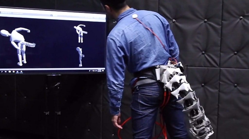 Mechanical tail for humans - BBC News