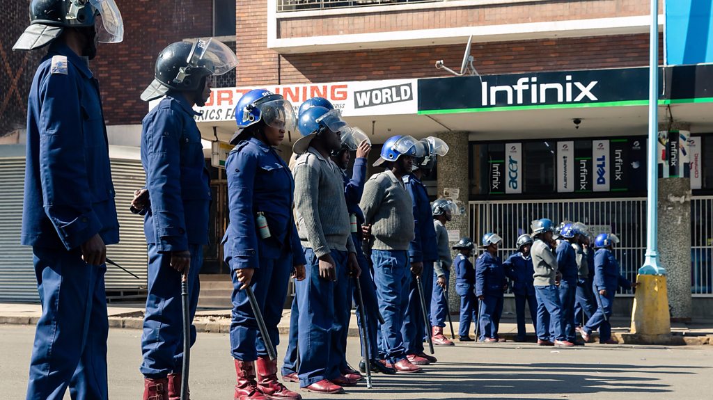 Police violence at Zimbabwe protests - BBC News