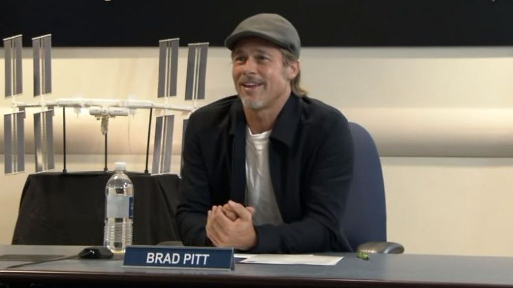 Brad Pitt speaks with astronaut from Nasa headquarters