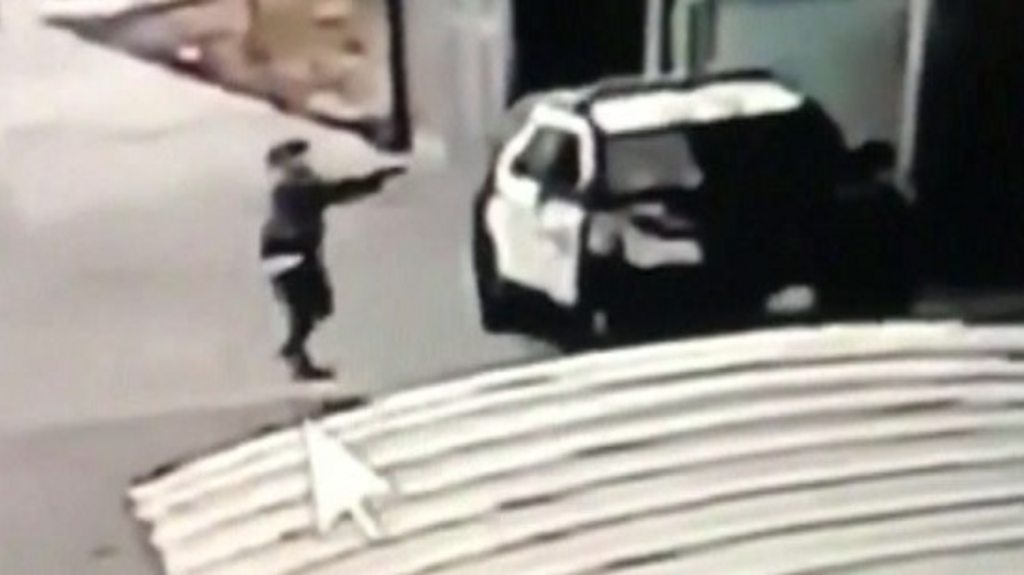 LA police officers shot in car 'ambush' - BBC News