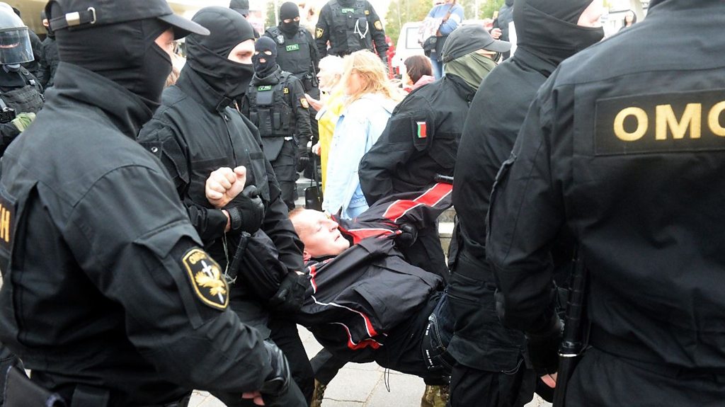 Mass arrests as crowds chant 'go away' - BBC News