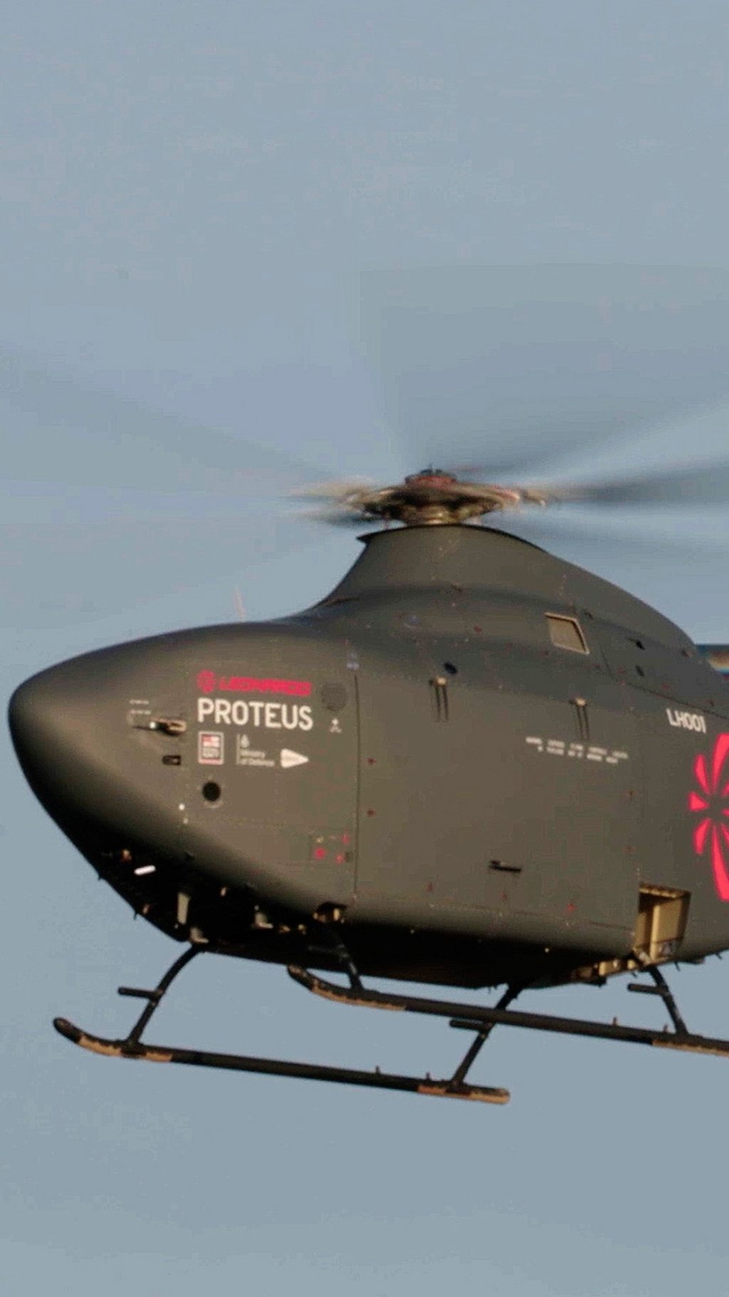 Royal Navy's first full-size unmanned helicopter takes flight - BBC News