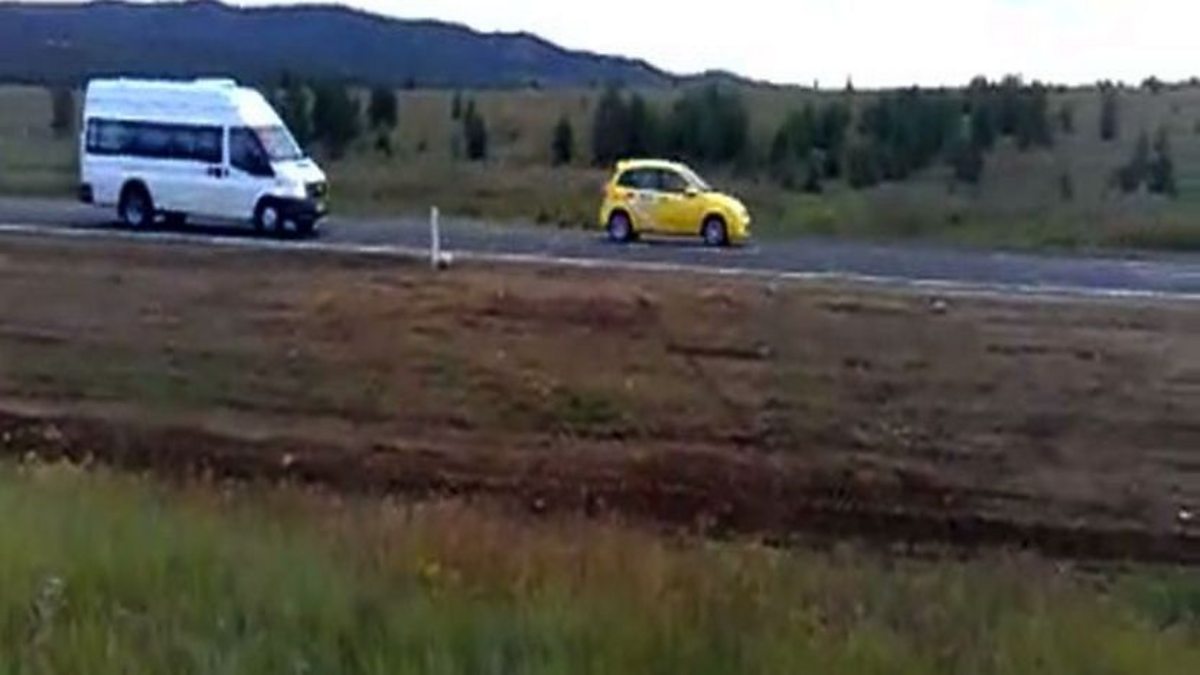BBC - Adam Curtis, Putin driving a yellow Lada August 2010