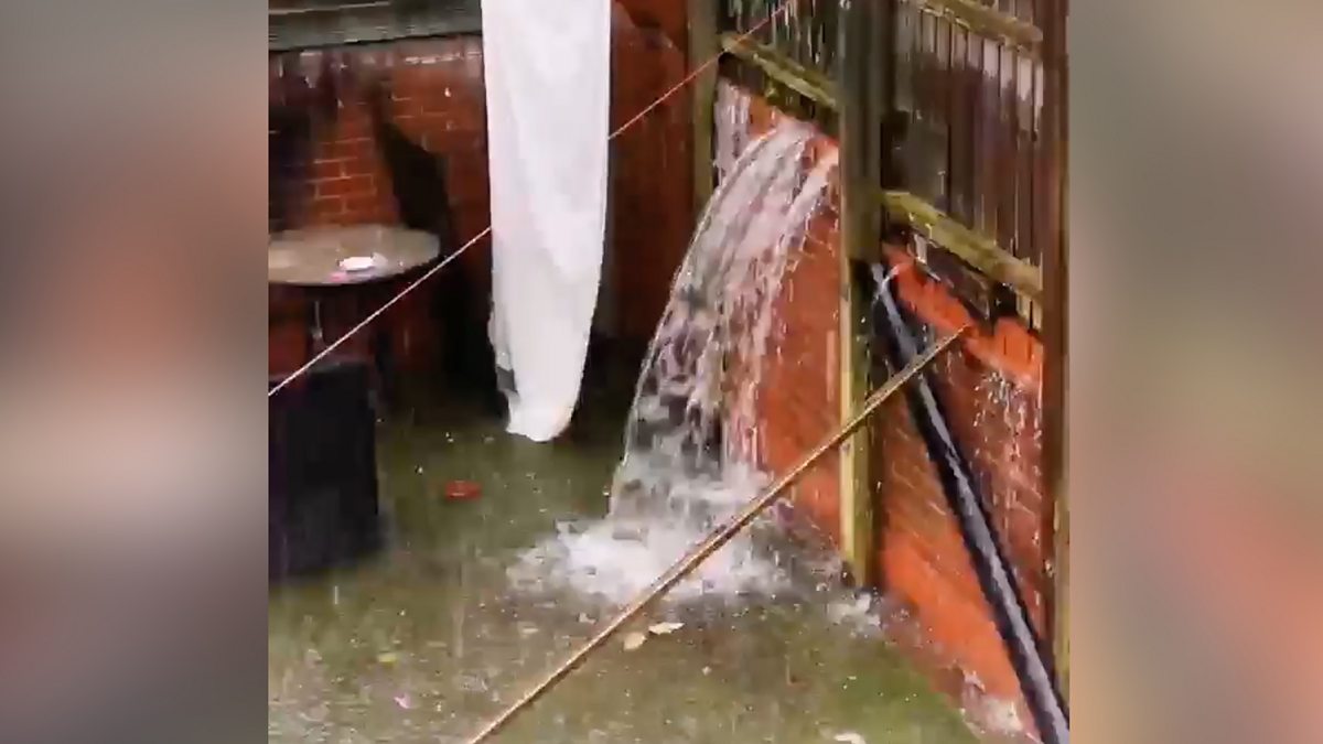 BBC Radio Norfolk - Chris Goreham, Rain causes waterfall in Norwich garden
