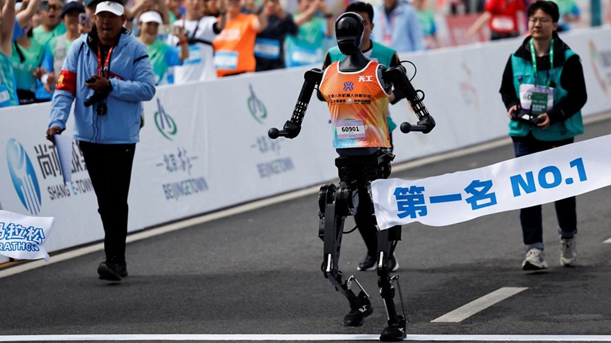 BBC News - Humanoid Robots Race In Beijing
