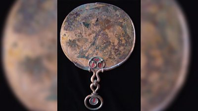Gloucester display for Celtic art mirror - BBC News