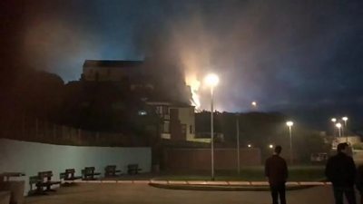 Fire burns at Portrush derelict property - BBC News