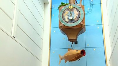 Cheltenham's wishing fish clock back in action - BBC News