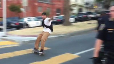 Riot police face skaters in San Francisco - BBC News
