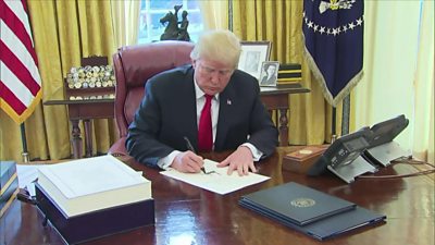 President Trump signs tax bill into law before Christmas - BBC News