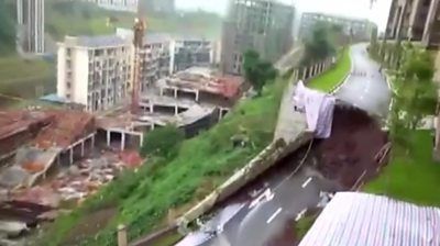 Road collapse caught on CCTV cameras in China - BBC News