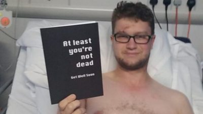 PC Tom Dorman takes first steps after leg amputation - BBC News